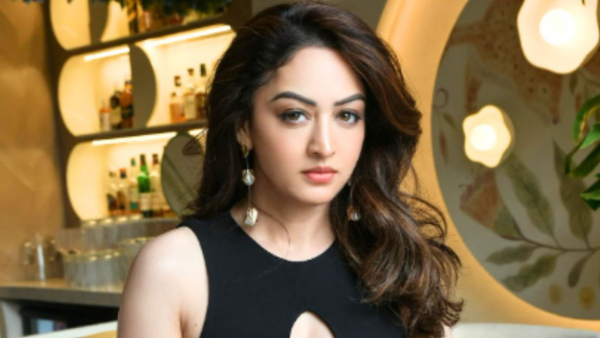 A Fashion Fiesta: Celebrating Sandeepa Dhar's Dazzling Style Evolution ...