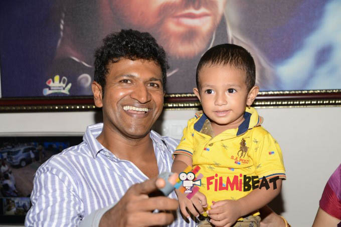 Puneeth Rajkumar With Rocking Star Yash Family - Filmibeat