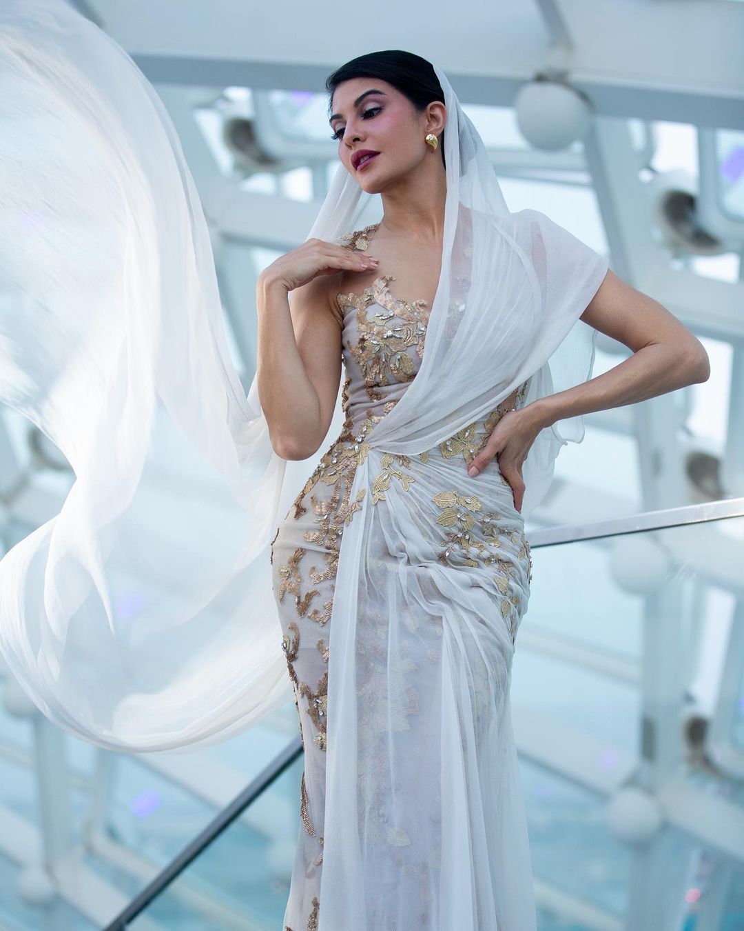 IIFA 2023: Jacqueline Fernandez Stuns in a hooded look, steals the spotlight in a white ensemble ...