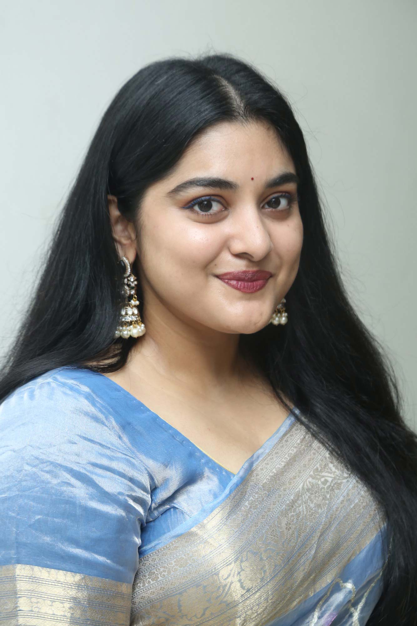 Nivetha Thomas Stuns in Blue Saree with Intricate Silver Detailing ...