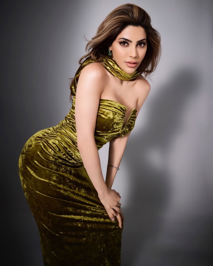 Nikki's Bold Fashion Choices: Luxe Fabrics And Striking Colors - Filmibeat