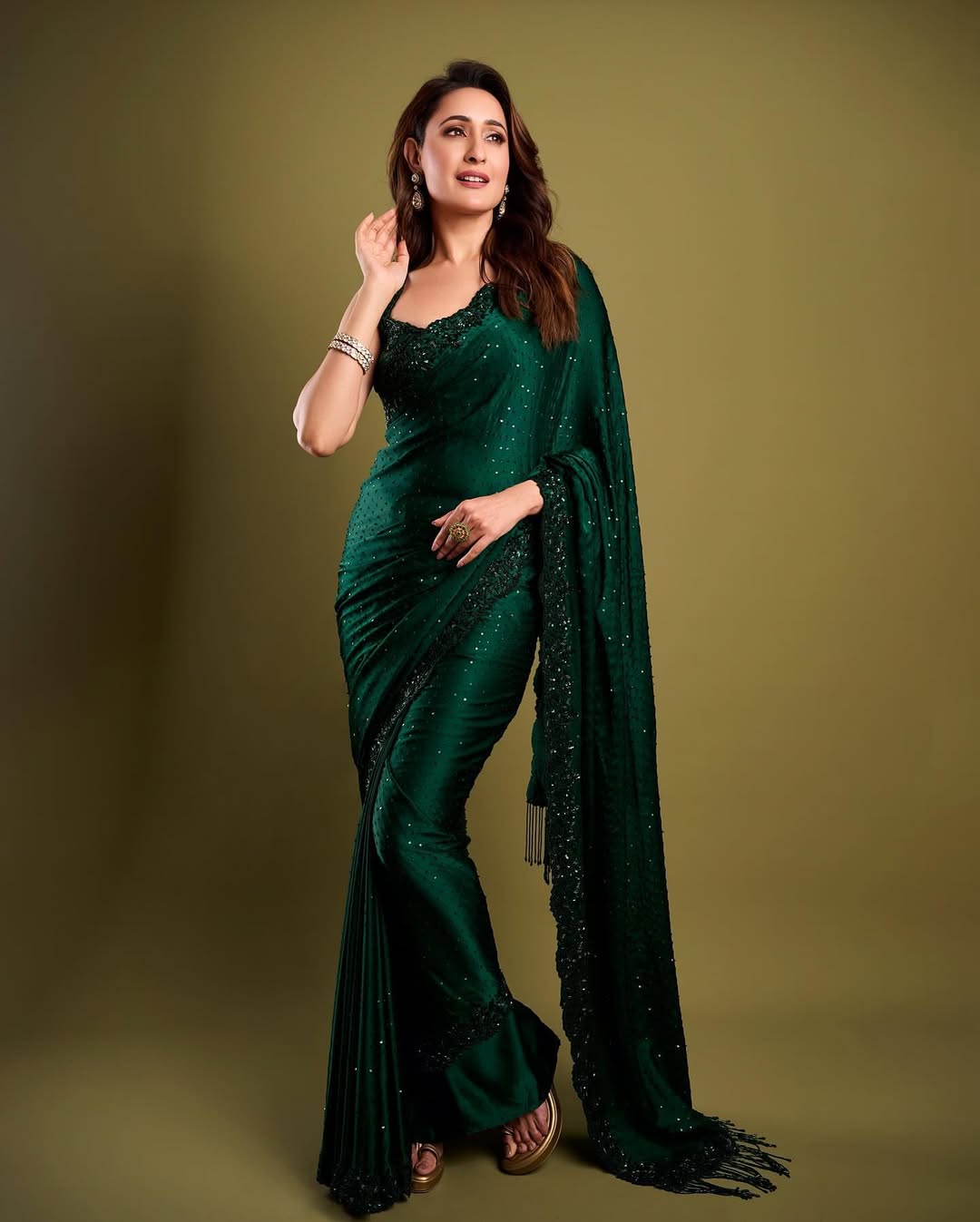 Pragya Jaiswal Radiates Elegance in Deep Emerald Green Saree - Filmibeat