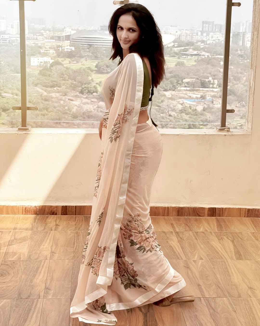 Jyothi Poorvaj Stuns In An Elegant White Saree With Green Blouse ...