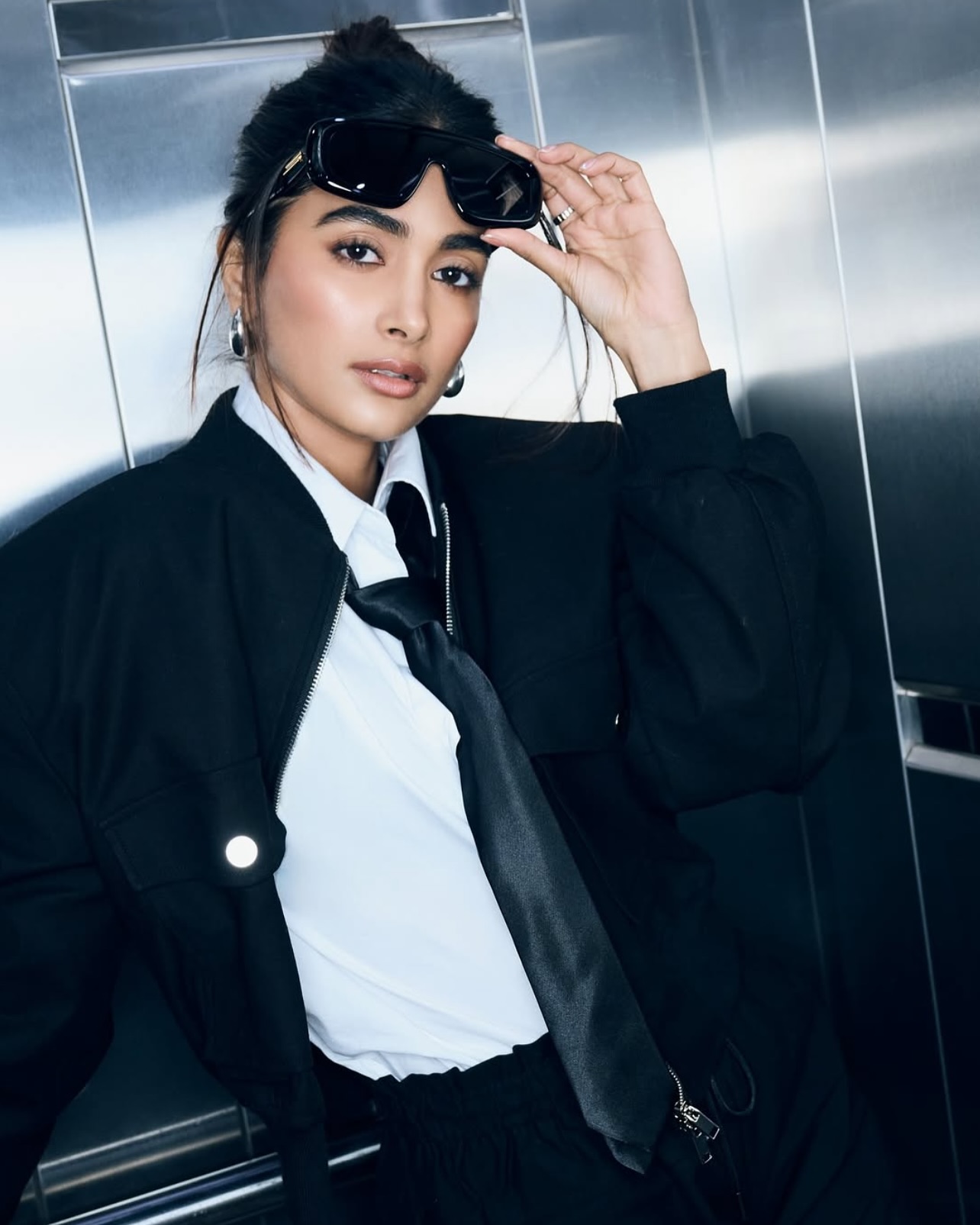 Pooja Hegde Stuns In A Black Outfit During A Elevator Encounter - Filmibeat
