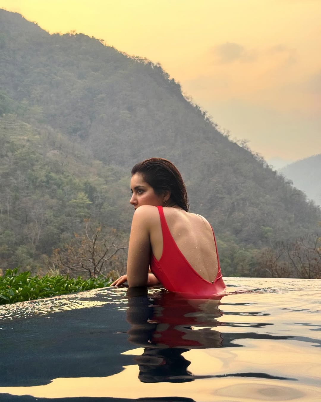 Raashi Khanna Enjoys a Scenic Mountain Retreat in a Stunning Red Swimsuit - Filmibeat