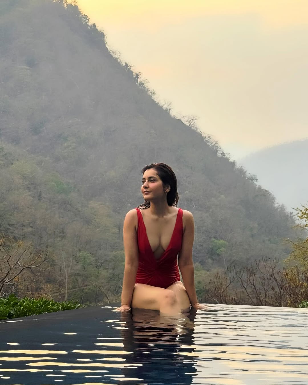 Raashi Khanna Enjoys a Scenic Mountain Retreat in a Stunning Red Swimsuit - Filmibeat