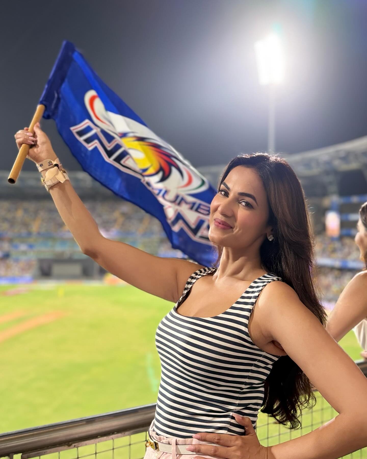 Sonal Chauhan Waves The Flag For Mumbai Indians At IPL Match, Creating A Nostalgic Buzz - Filmibeat