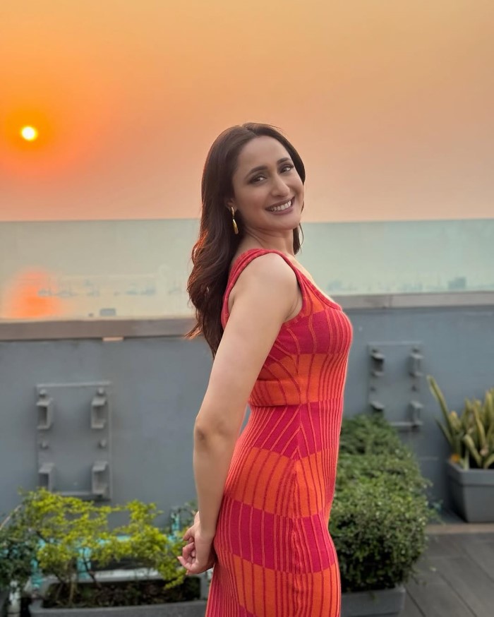 Pragya Jaiswal Effortless Glamour With A Playful Sunset Pose - Filmibeat