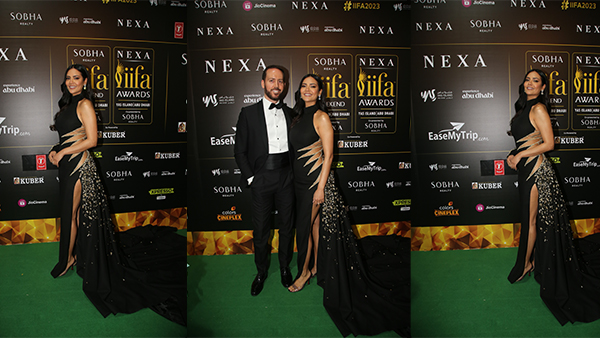 IIFA 2023: Esha Gupta oozes boldness in her Tony Ward gown, poses with a mystery man - Filmibeat