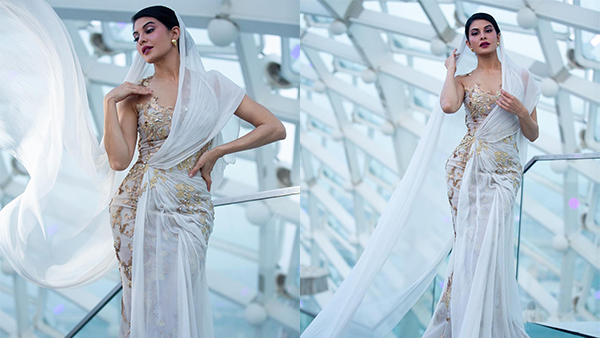 IIFA 2023: Jacqueline Fernandez Stuns in a hooded look, steals the spotlight in a white ensemble ...