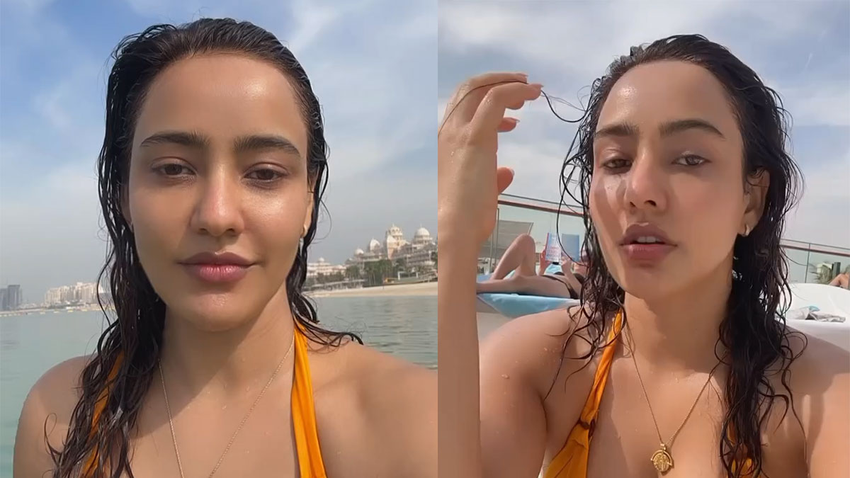 Neha Sharma Enjoys Year-End Beach Vacation in Yellow Swimsuit - Filmibeat